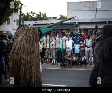 Performers from various ethnic groups participate in a parade in ...