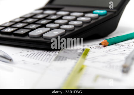 Photo of the Business Architectural project, pair of compasses, glasses ...