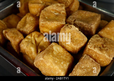 Photo of a stack of freshly fried tokwa or tofu or soy bean curd Stock ...