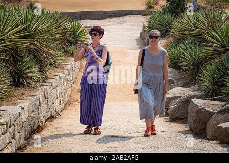 Indian people visiting Hampi ruins, Karnataka, India Stock Photo - Alamy
