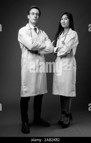 multiethnic doctors with crossed arms Stock Photo - Alamy
