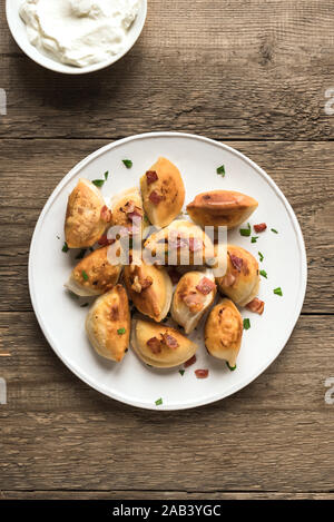 A view of roasted meat on wooden board Stock Photo - Alamy