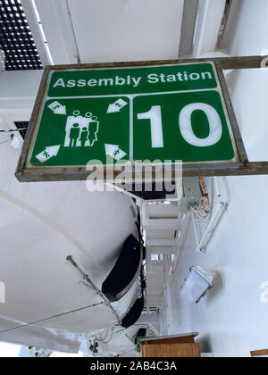 A cruise ship sign designating where the assembly station is in case of ...
