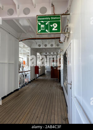 A cruise ship sign designating where the assembly station is in case of ...