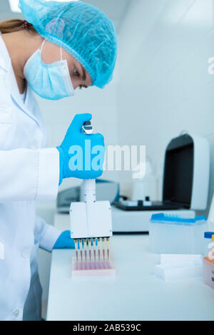 Science concept: Red Scientific Research on textured concrete wall ...