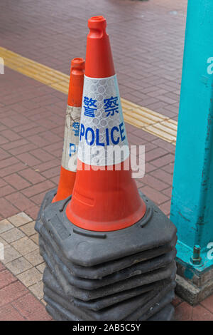 Stacked Traffic Police Cones in Hong Kong Stock Photo - Alamy