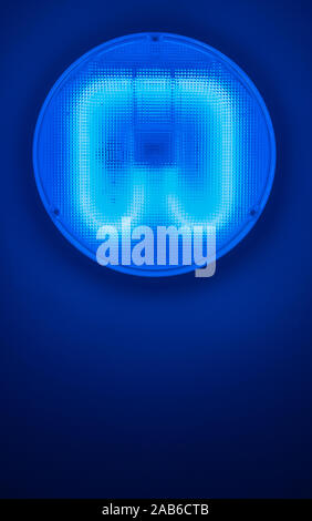 Ceiling lamp in blue light. Ceiling lamp Stock Photo - Alamy