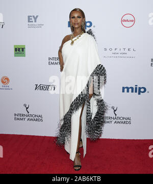 Iman arrives at the 47th International Emmy Awards gala at the Hilton ...