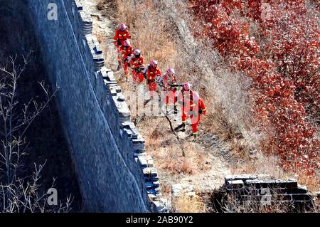 Chinese firefighters from the local forest firefighting brigade patrol ...