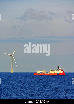 EDT Hercules support vessel by a windfarm turbine North sea Stock Photo ...