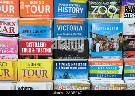 Tourist brochures and maps for local attractions on display at the ...