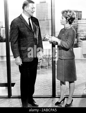 HELLFIGHTERS, from left: John Wayne, Jim Hutton (hard hat), Edmund ...