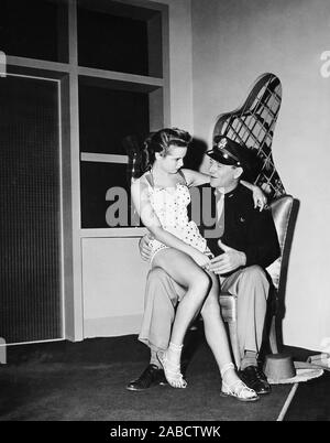 Janet Leigh and John Wayne, on-set of the Film, "Jet Pilot", RKO Radio Pictures with ...