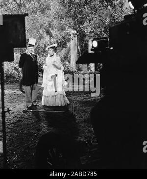 POPPY, W.C. Fields, Catherine Doucet, Adolphe Menjou (visiting), director Edward Sutherland, on ...