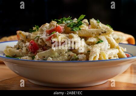 Greek penne Aegean pasta salad with crumbled feta cheese Stock Photo ...