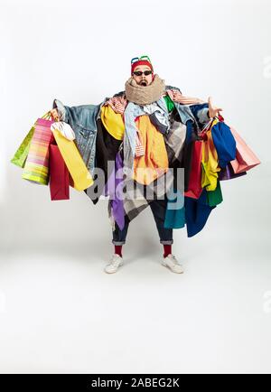 Shopping like an issue. Man addicted of sales. Overproduction and crazy ...