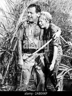 THE 7TH DAWN, from left, William Holden, Capucine, 1964 Stock Photo - Alamy