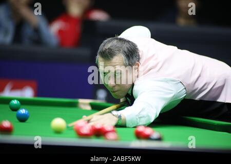 Dominic Dale of Wales plays a shot to Alan McManus of Scotland in their ...