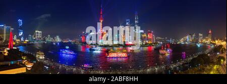 A grand light show is performed at the Bund with local landmarks as ...