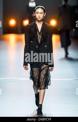 A model walks the runway for ANIRAC by Carina Lau at 2020 Spring and ...
