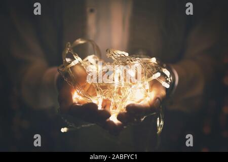 Christmas cozy background. Female hand writing in blank notebook with ...