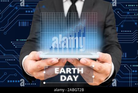 Writing note showing Earth Day. Business concept for Worldwide ...