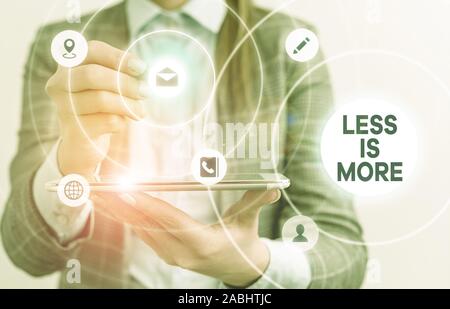 Writing note showing Less Is More. Business photo showcasing Minimalist ...