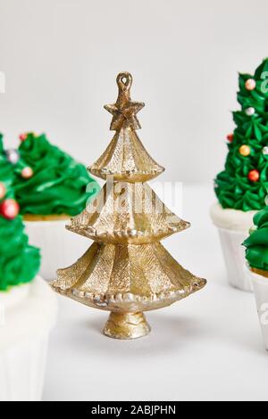 Selective focus shot of the delicious decorative cake on a brown table ...