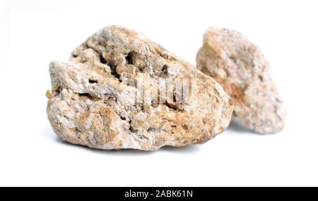 Ambergris, ambre gris, ambergrease or grey amber. Isolated on white ...