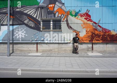 Graffiti artist Loomit (Mathias Köhler) in front of one of his ...