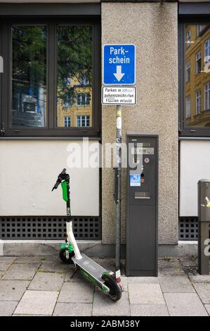 Motor scooter with parking ticket in Kaohsiung, Taiwan; yellow slips ...