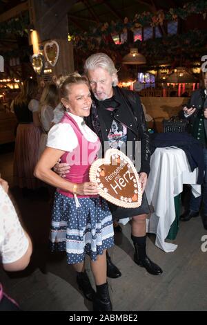 Actress Christine Neubauer and festival tent owner and co-host Sepp ...