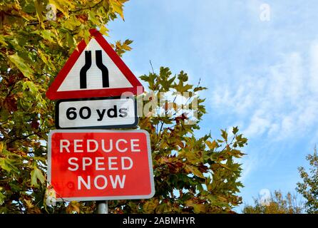Maidstone, Kent, England, UK. Road signs and markings. Slow / keep left ...