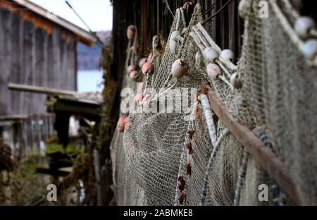 Fishing nets hang on the shore of Lake Cuitzeo, Michoacan, Mexico Stock ...