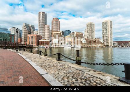 Boston downtown skyline in the morning with urban skyscrapers over sea ...