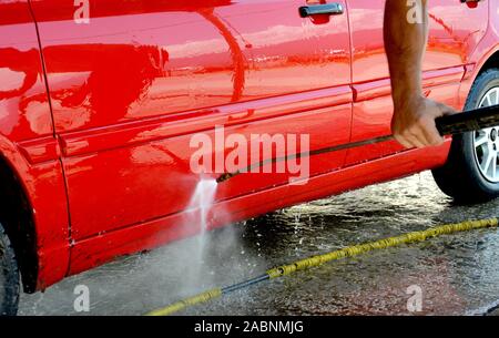 washing red car outdoor, image of a Stock Photo - Alamy