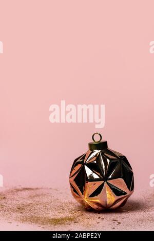 Rose gold Christmas, New Year background with golden bauble, holiday ...