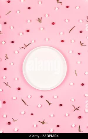 Top view of empty pink plate on wooden background. Empty space for your ...