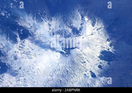 Volcano from space. Elements of this image furnished by NASA. High ...
