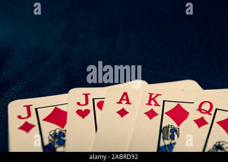 red euchre diamond hand on black background Stock Photo - Alamy