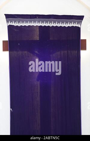 A crucifix is veiled for Lent. Hoi An Cathedral. Vietnam Stock Photo ...