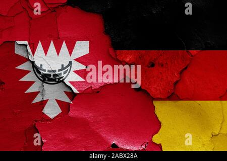 Flags of Kiel and Germany painted on cracked wall Stock Photo - Alamy