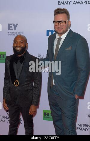 Phathutshedzo Makwarela and Gwydion Beynon attend the 2019 International Emmy Awards at New York ...