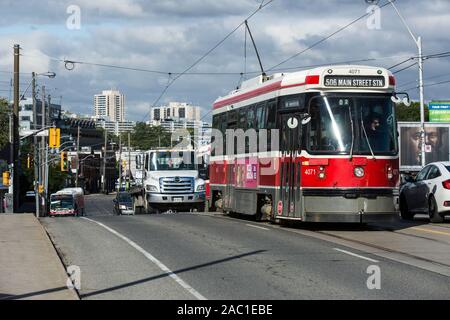 toronto ttc streetcar on city street transit in urban environment sunny ...