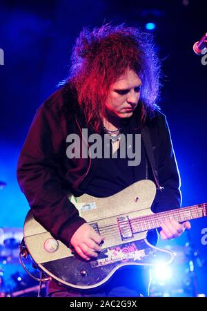 Robert Smith of The Cure performs on the Orange Stage at Roskilde ...