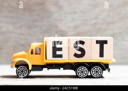 Wood letter in word est (abbreviation of established, estimated ...