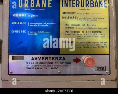 Old italian public telephone sign Stock Photo - Alamy