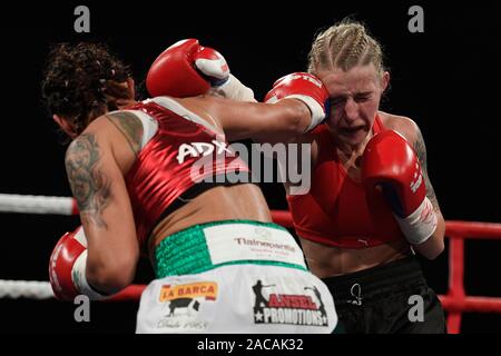 Czech professional boxer Fabiana Bytyqi (left) defeats Denise Castle ...