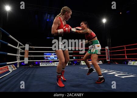 Czech professional boxer Fabiana Bytyqi (left) defeats Denise Castle ...