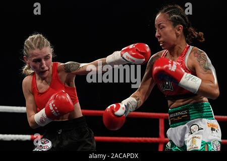 Czech professional boxer Fabiana Bytyqi (left) defeats Denise Castle ...